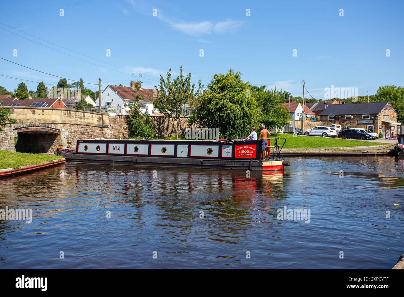 Canal narrowboat making the turn into the Llangollen canal from Trevor ...