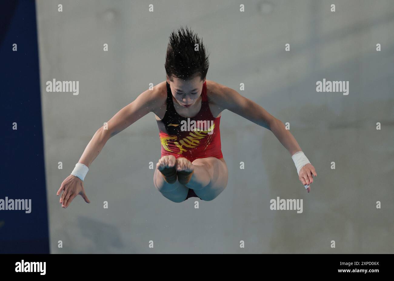 QUAN Hongchan of China performs during the women's diving 10-meter ...