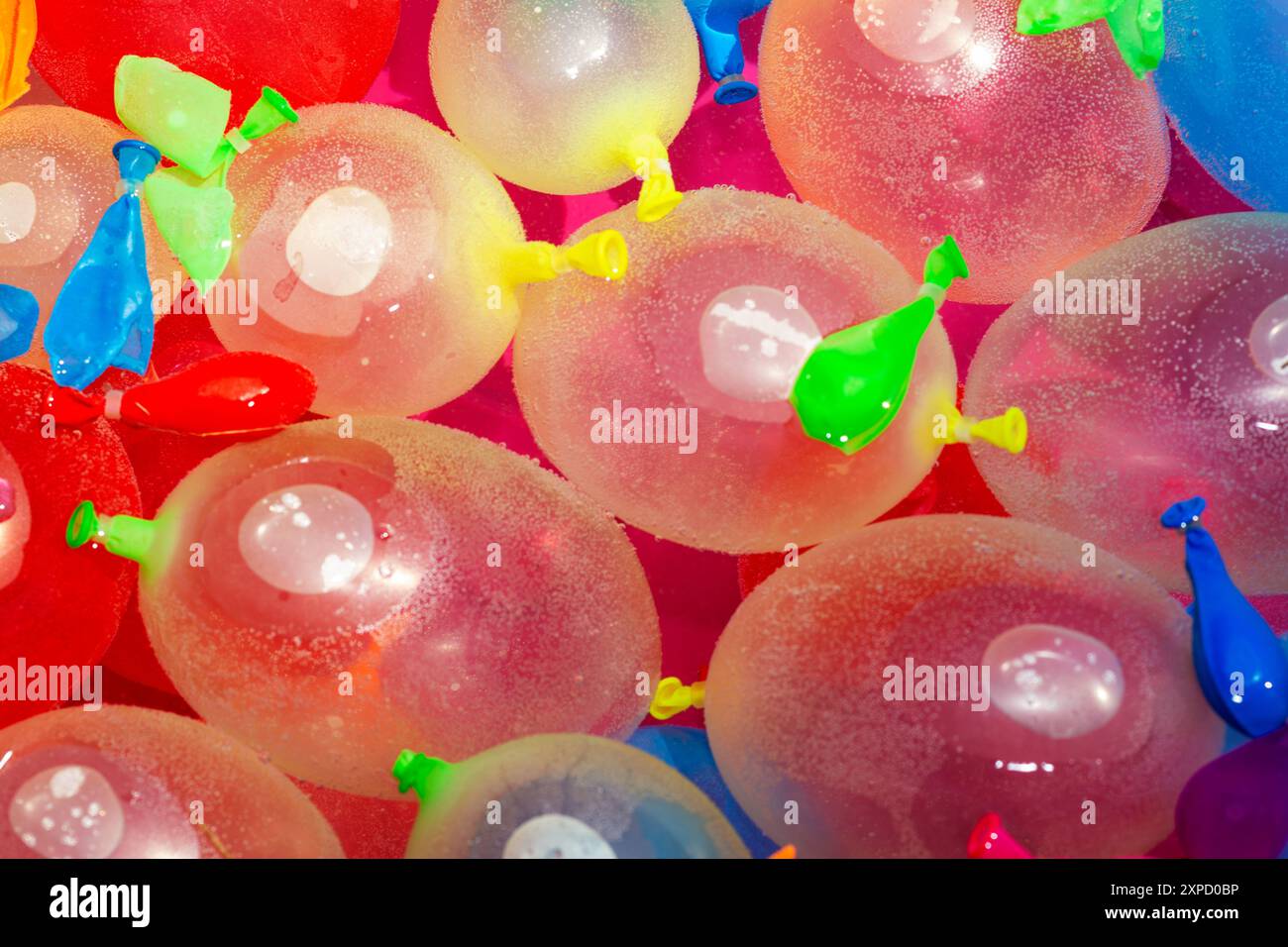 Multicolored balloons in pool background hi-res stock photography and ...