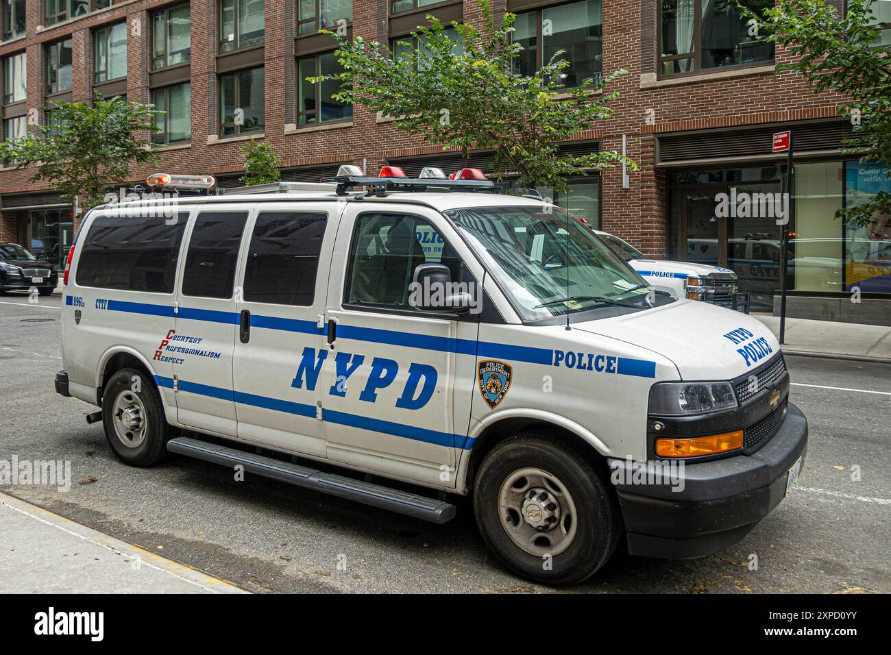 New York, NY, USA - August 3, 2023: NYPD blue-white Chevrolet van ...