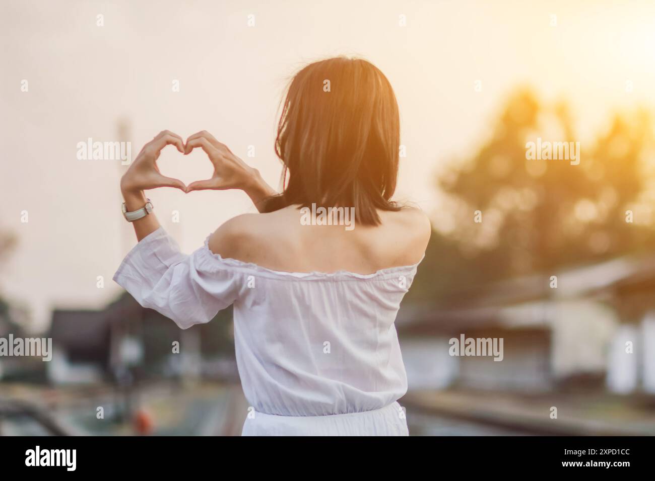 The hand-painted girl's silhouette is a heart-shaped symbol of love ...