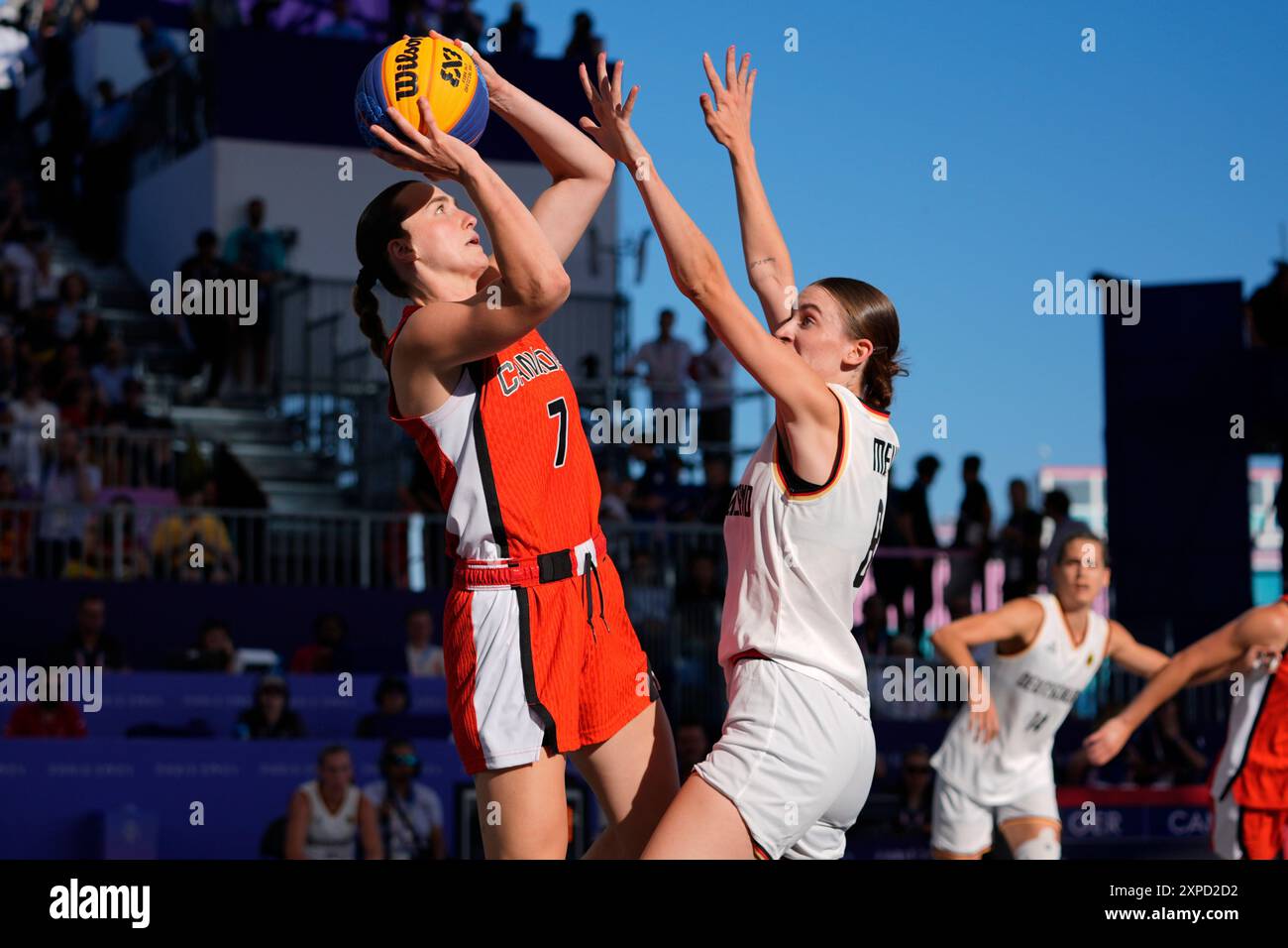 Canada's Paige Crozon (7) shoots over Germany's Elisa Mevius during a ...