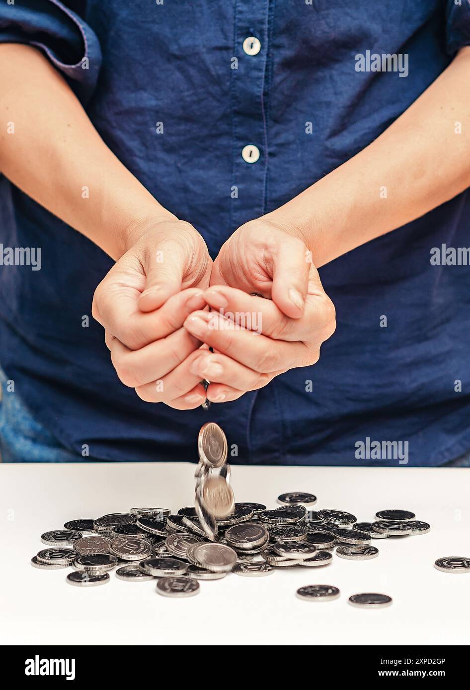 Business men gold coins hi-res stock photography and images - Alamy