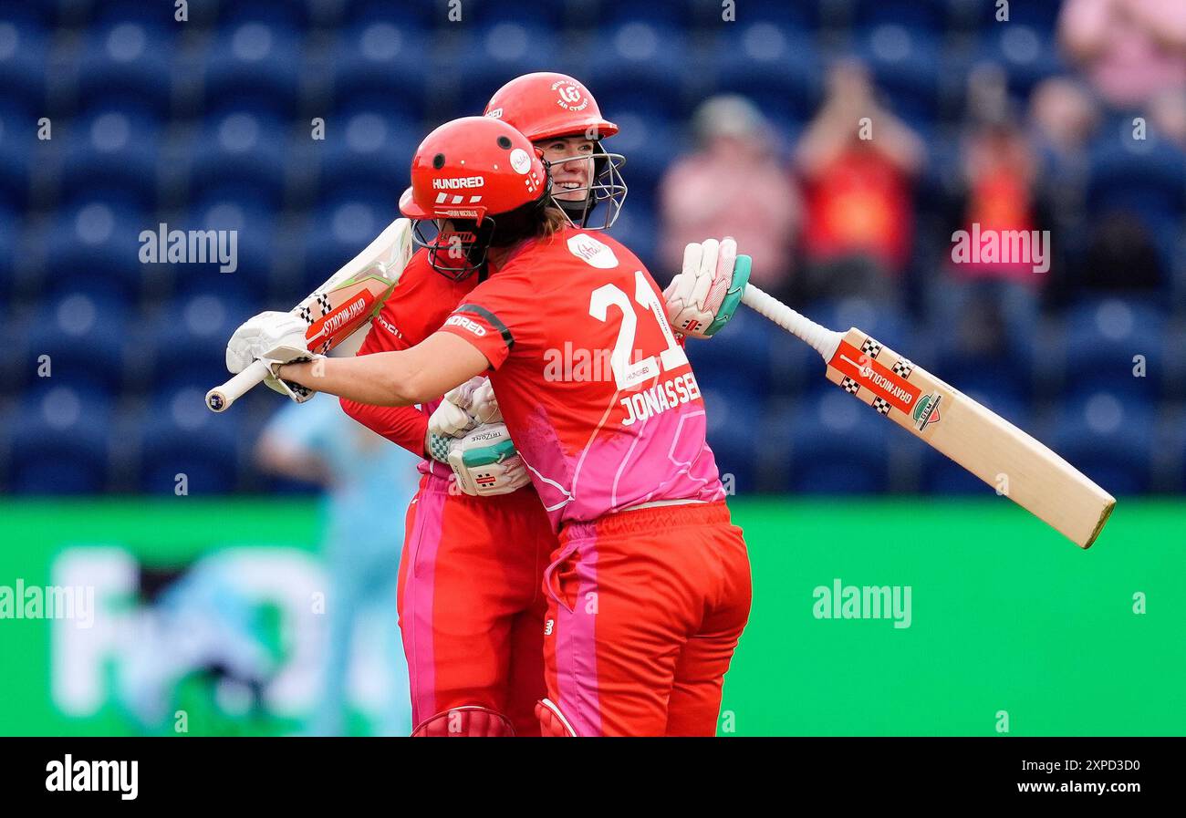 Welsh Fire’s Sarah Bryce (left) and Jess Jonassen celebrate their side ...