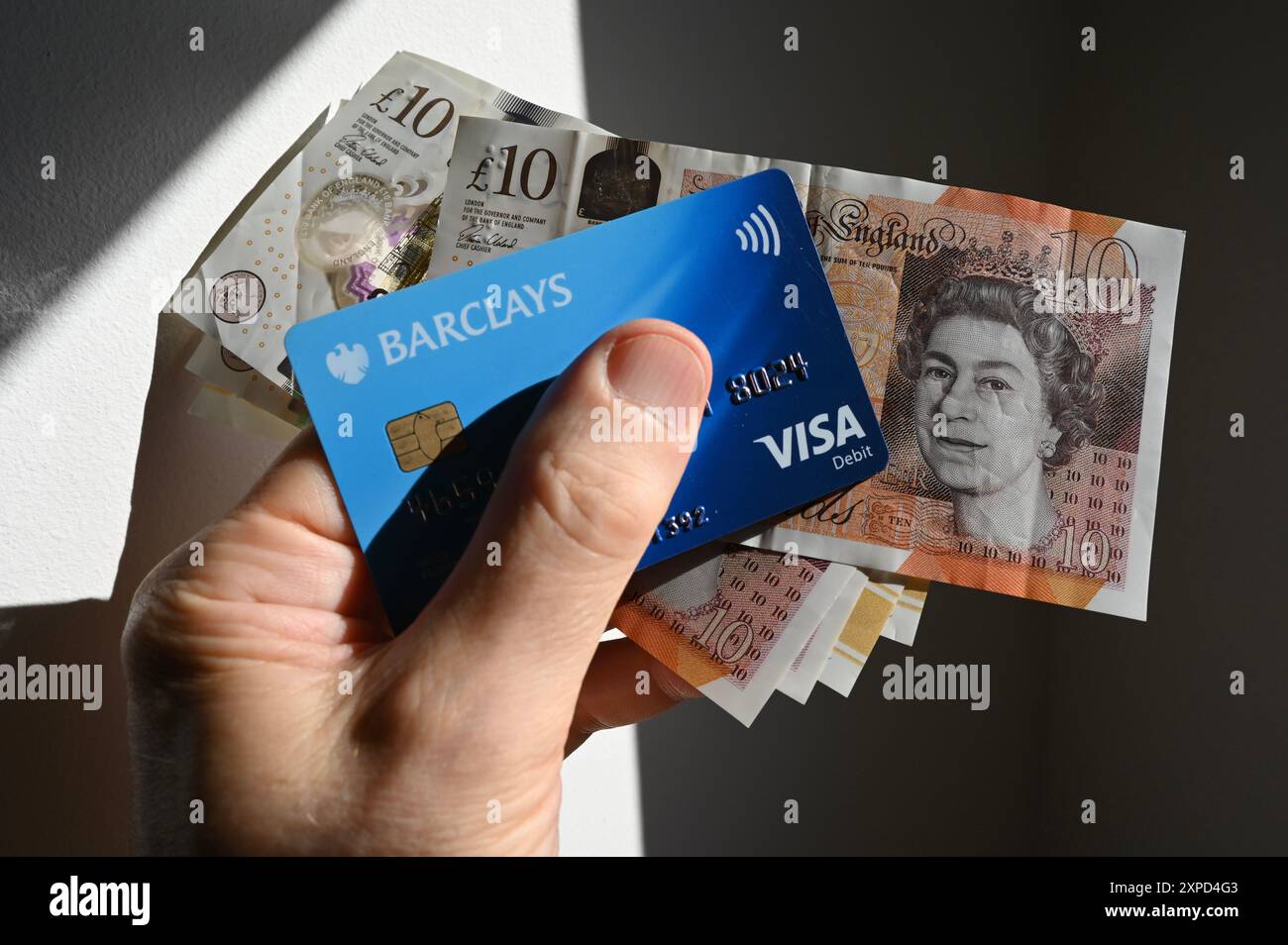 Ten pound notes and Barclays Visa card Stock Photo - Alamy