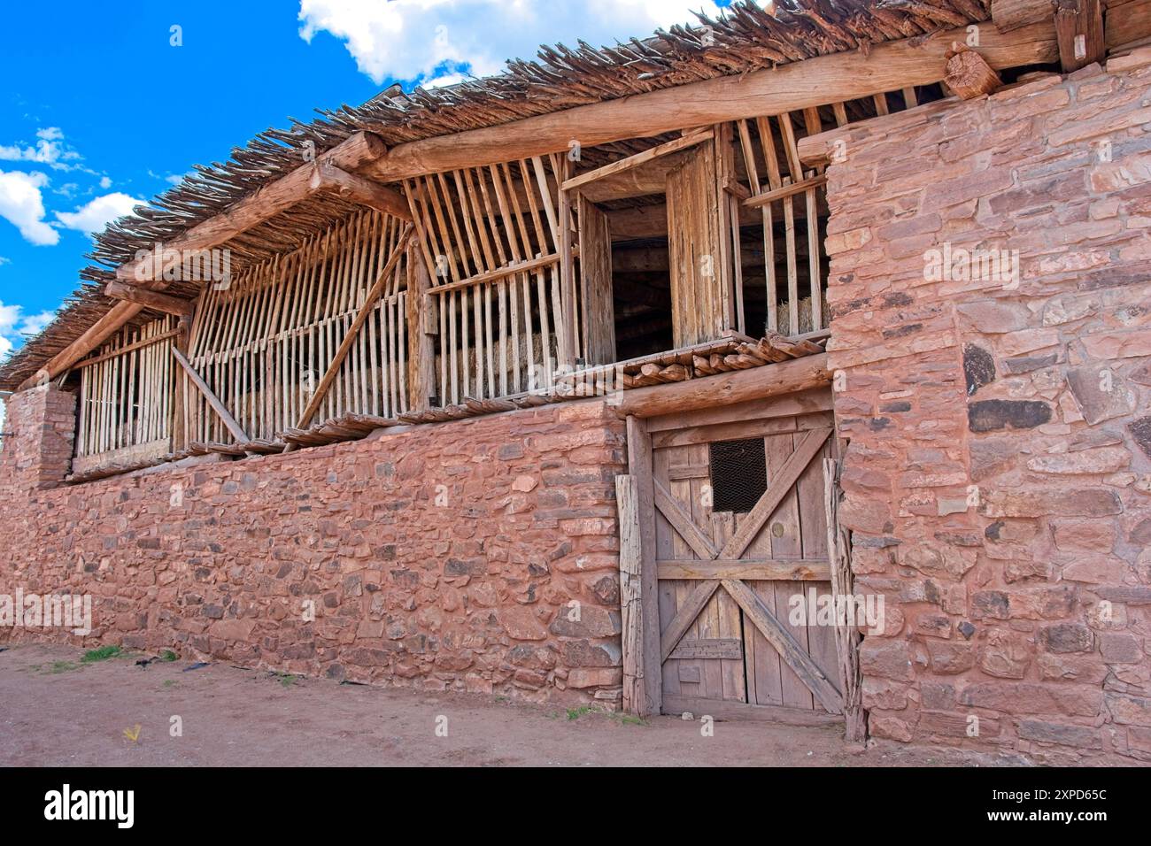 Stone barn with hay loft and wood sticks roof Stock Photo - Alamy