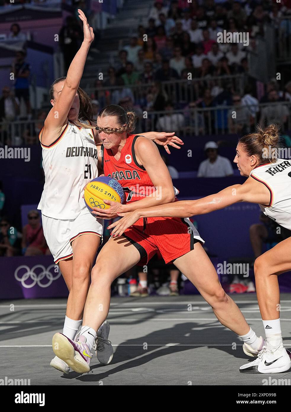 Paris, France. 5th Aug, 2024. Paige Crozon (C) of Canada drives during ...