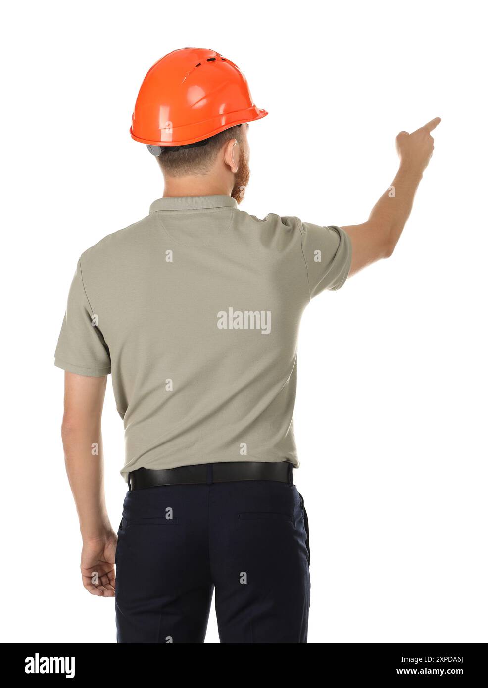 Engineer in hard hat pointing at something on white background, back ...