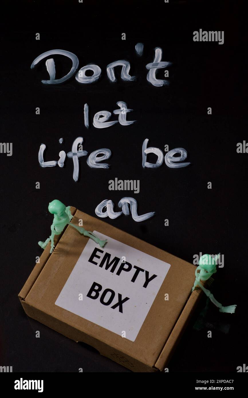 Don't let life be an empty box - handwritten in white letters on black ...