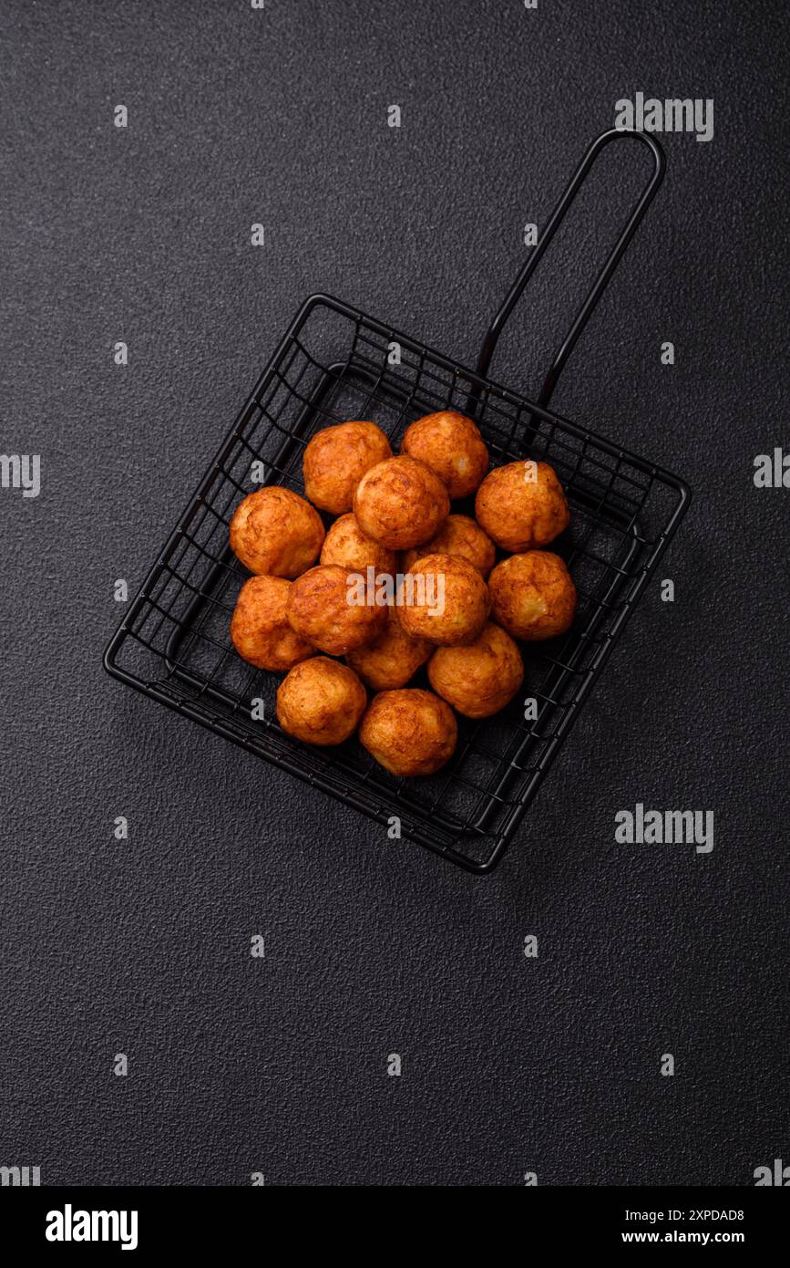 Delicious crispy balls breaded with mozzarella cheese, salt and spices ...