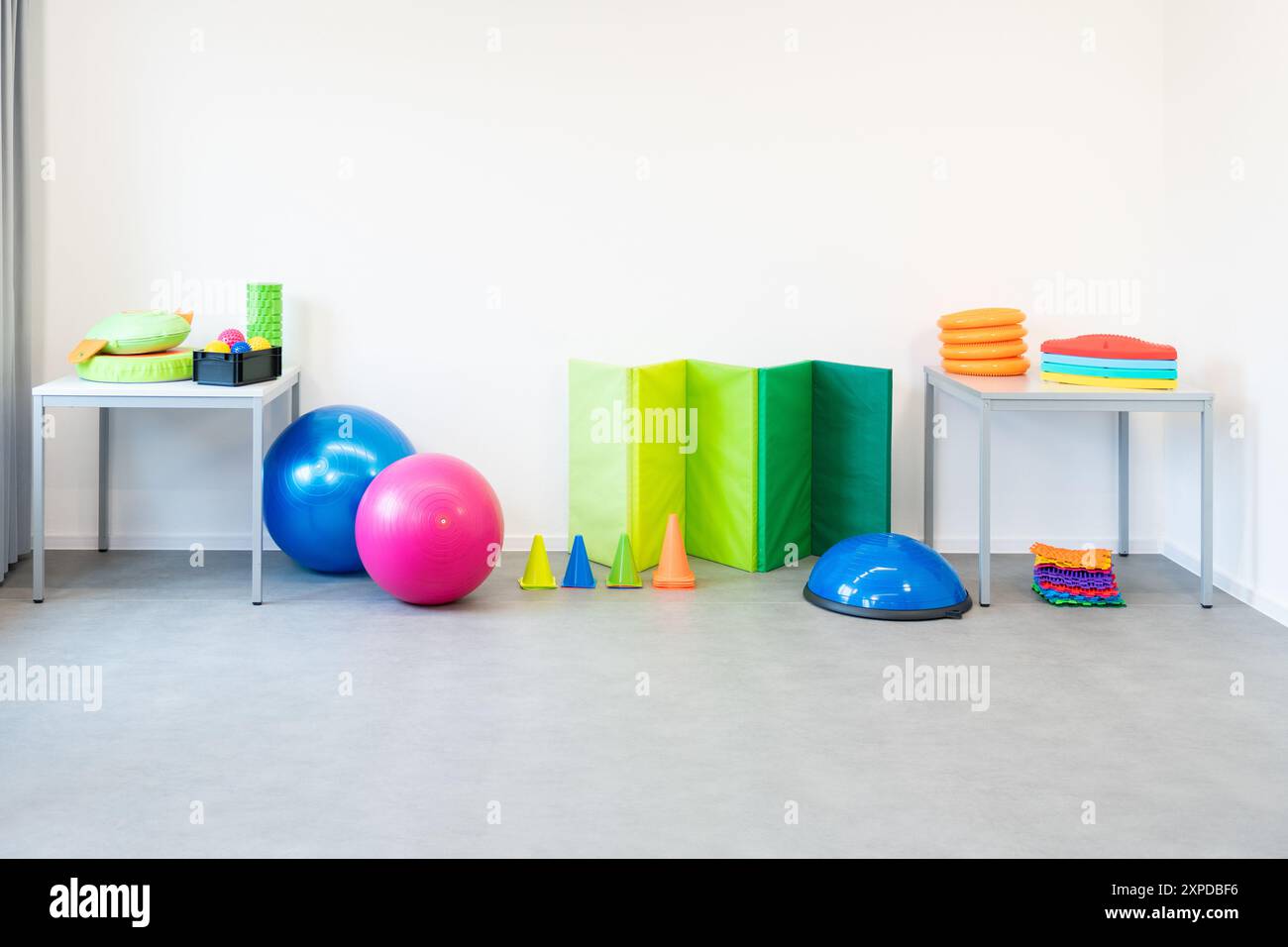 Colorful equipment used in child physical therapy sessions ...