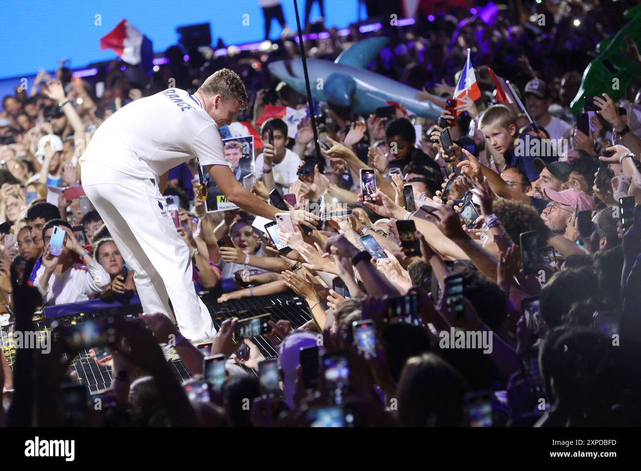 Paris, France. 05th Aug, 2024. Leon Marchand and others members of ...