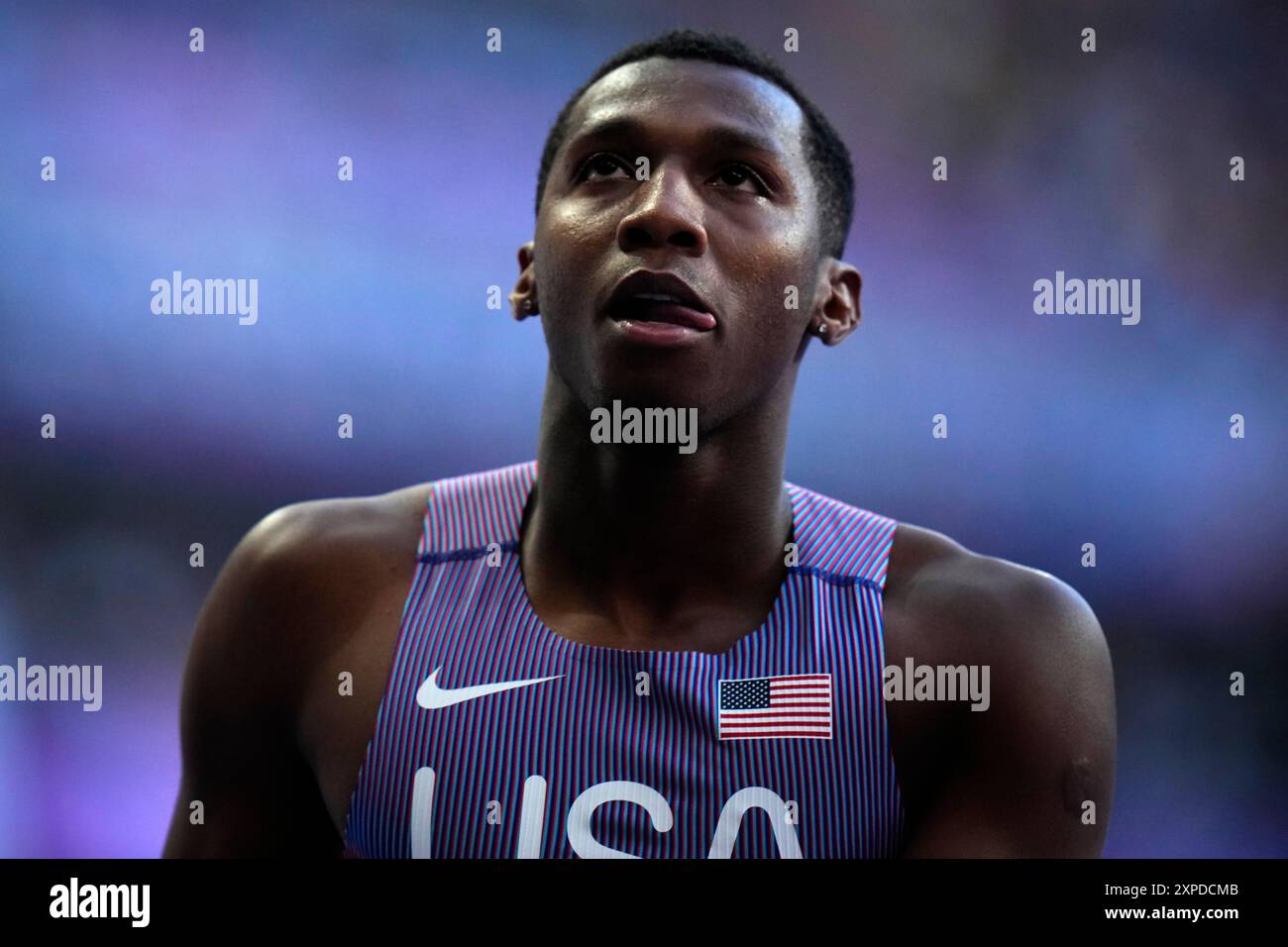 Erriyon Knighton, of the United States, reacts after competing in a men ...