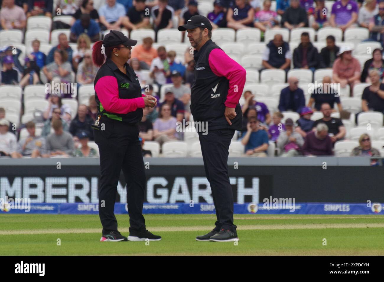 Leeds, 4 August 2024. Umpires Jasmine Naeem and Mark Newell at the fall ...