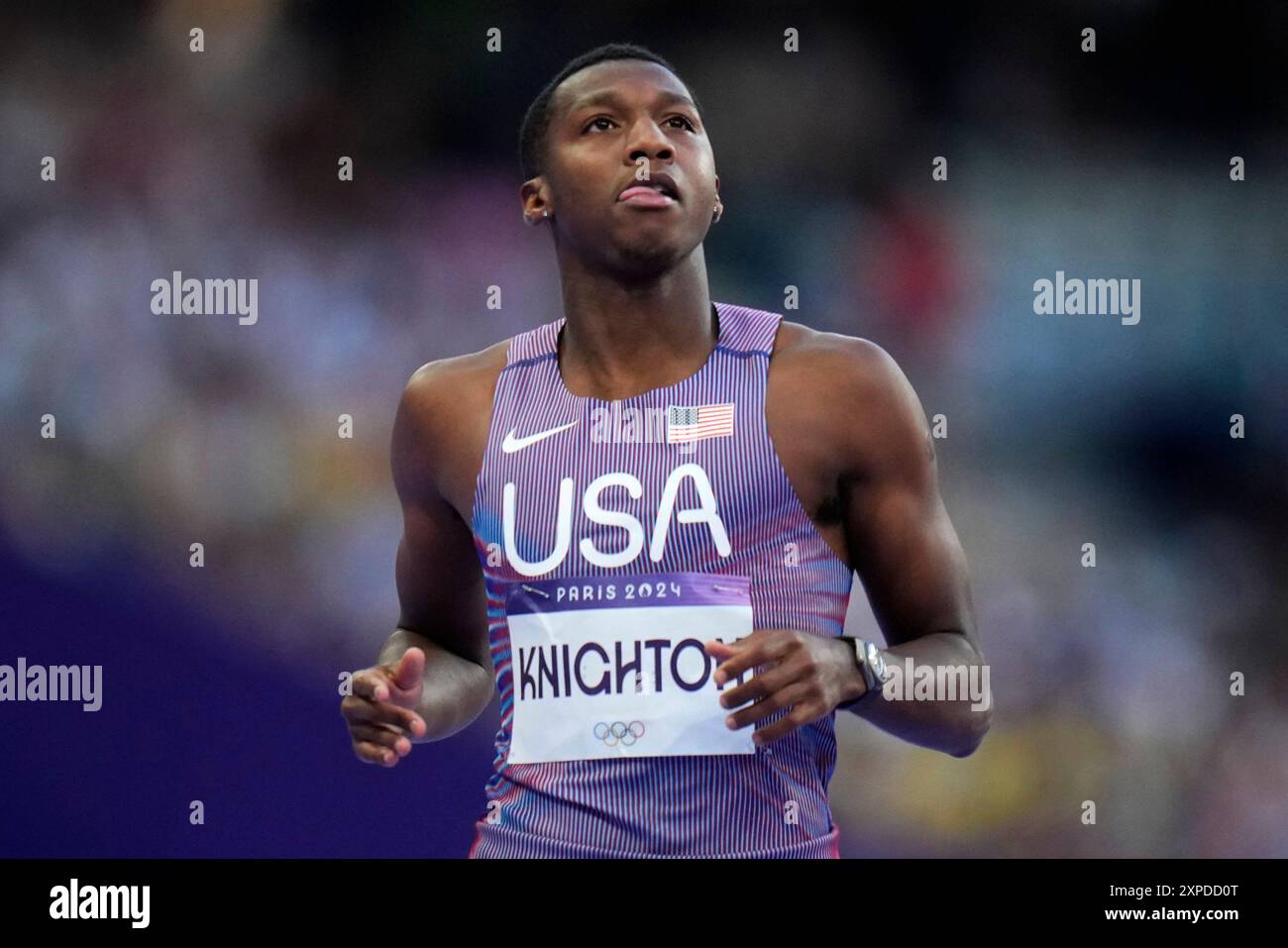 Erriyon Knighton, of the United States, reacts after competing in a men ...
