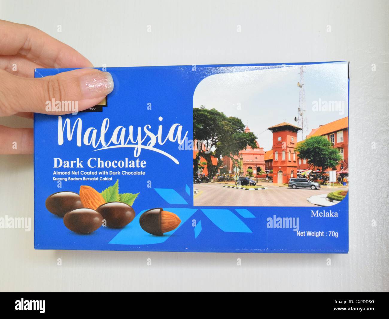 Organic dark chocolate from Sarawak, Malaysia in person's hand Stock ...