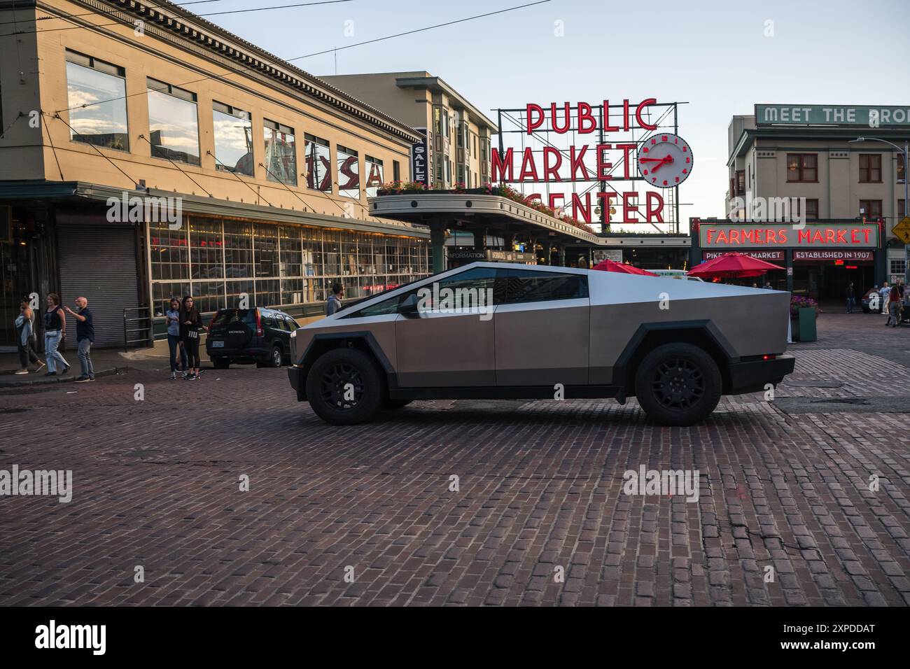Seattle, USA. 30th Jul, 2024. A Tesla Cybertruck passing Pike Place ...