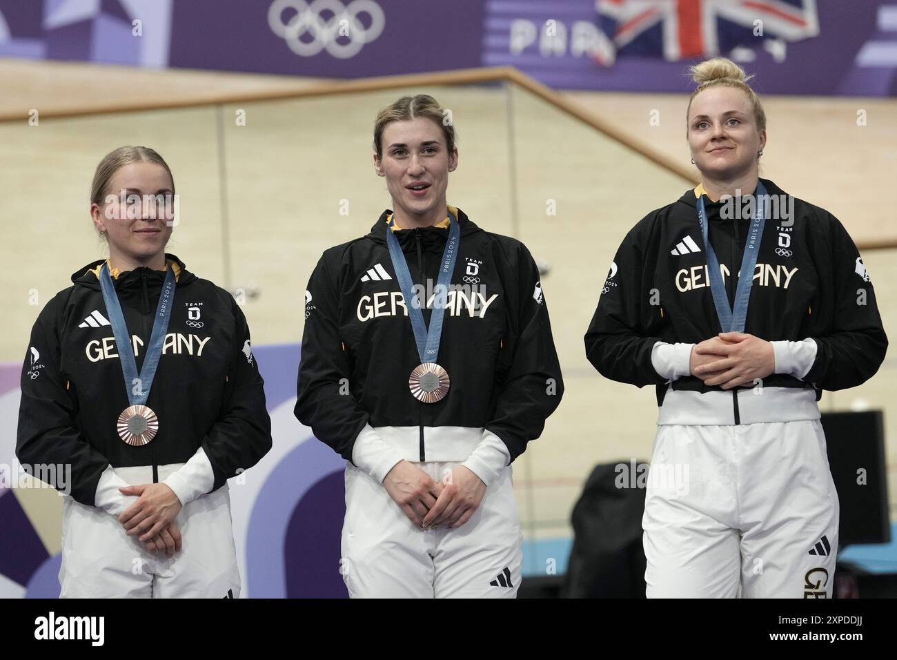 Germany's Lea Friedrich, left, Pauline Grabosch, center, and Emma Hinze ...