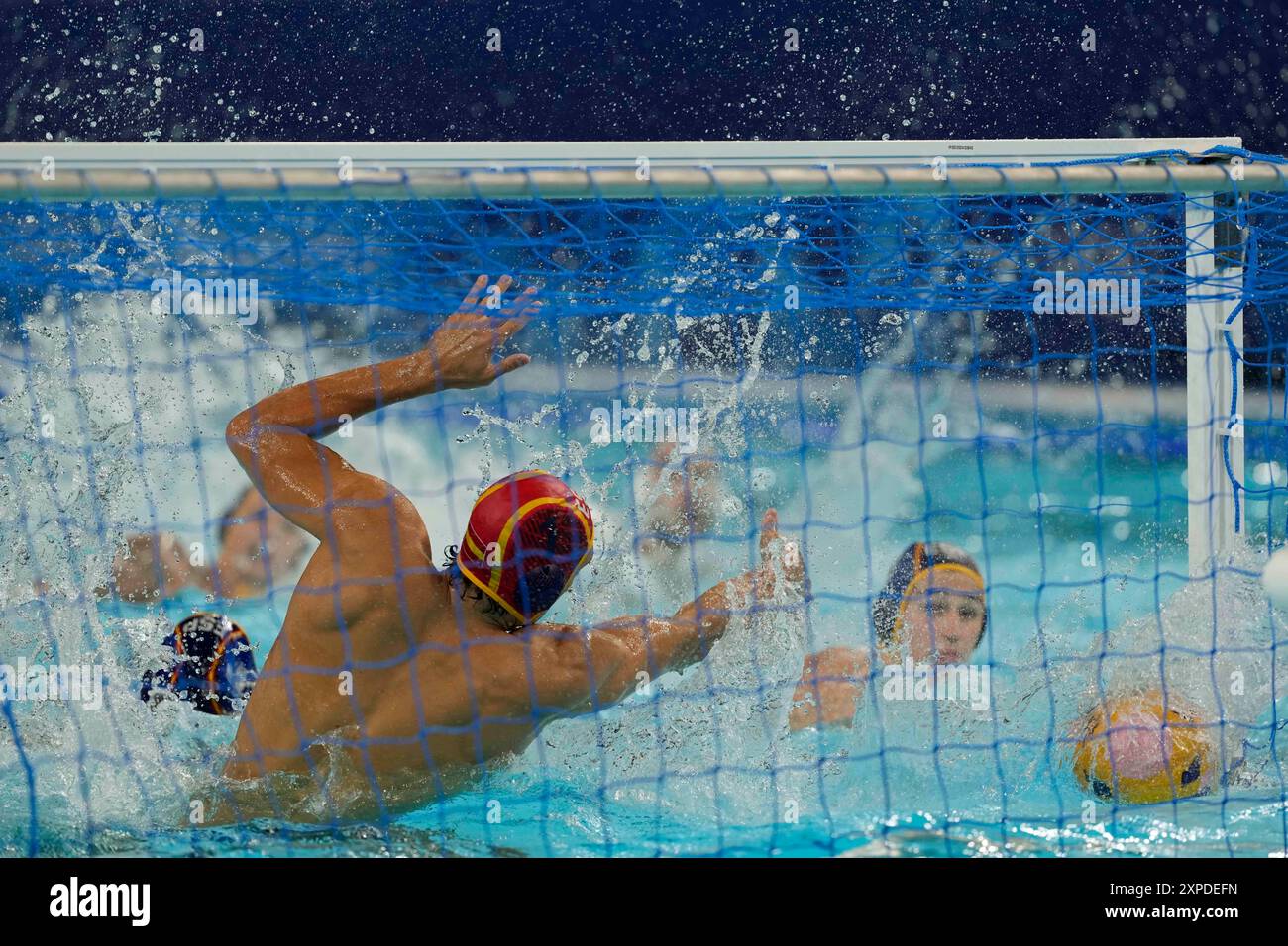 France's Alexandre Bouet scores during a men's Group B preliminary ...