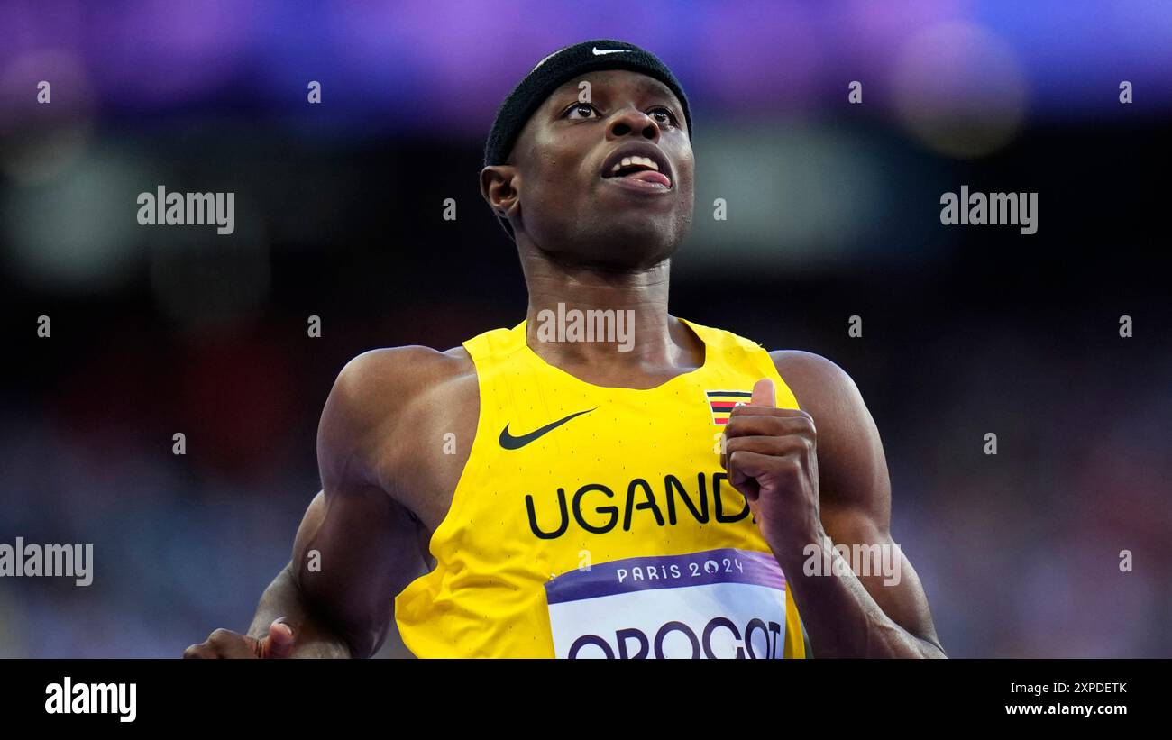 Tarsis Gracious Orogot, of Uganda, competes in a men's 200-meters' heat ...