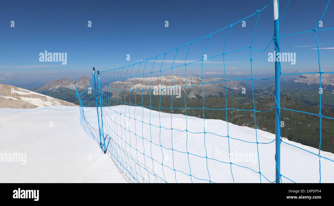 protection net on the Marmolada glacier which is melting due to climate ...