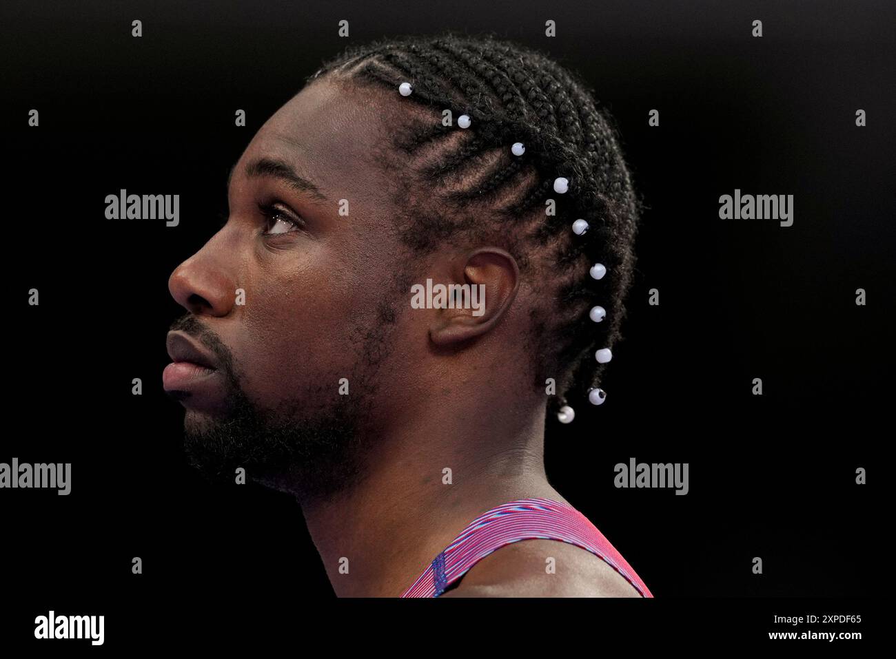 Noah Lyles, of the United States, prepares for a heat in the men's 200 ...