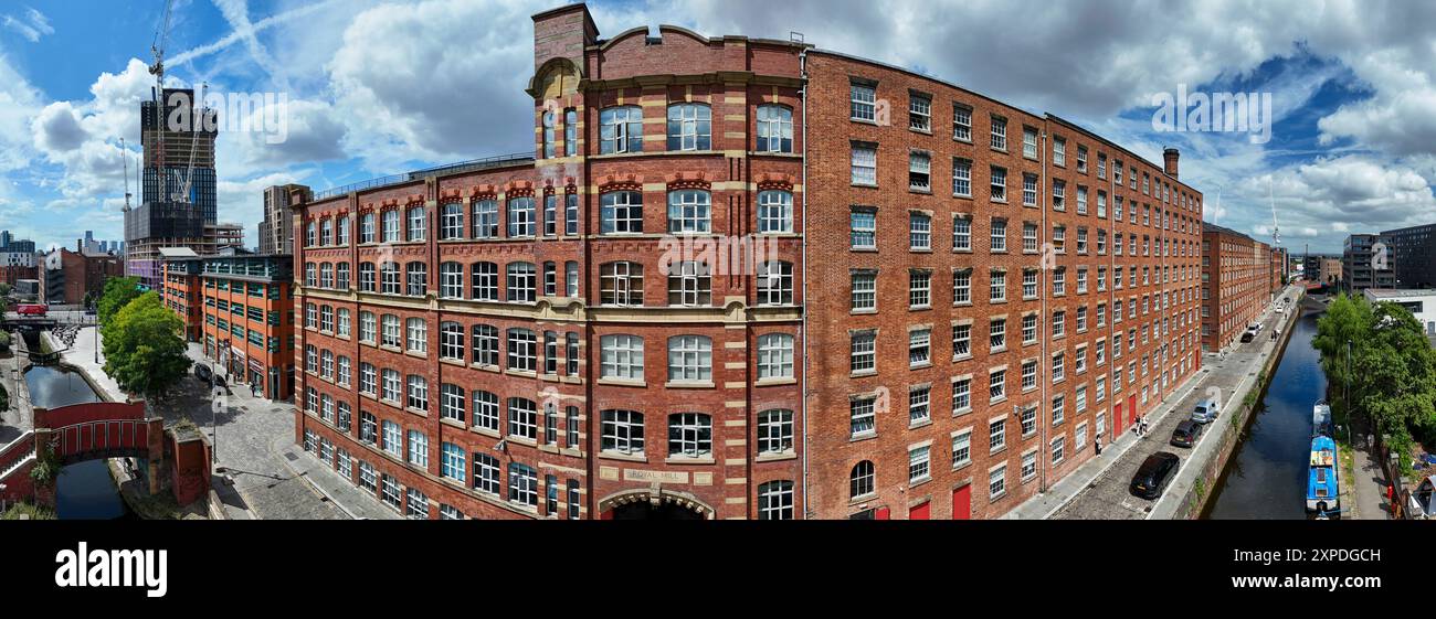 Red brick, old cotton mills buildings next to Rochdale canal in Ancoats ...