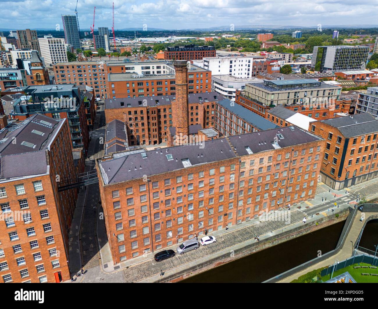 Red brick, old cotton mills buildings next to Rochdale canal in Ancoats ...