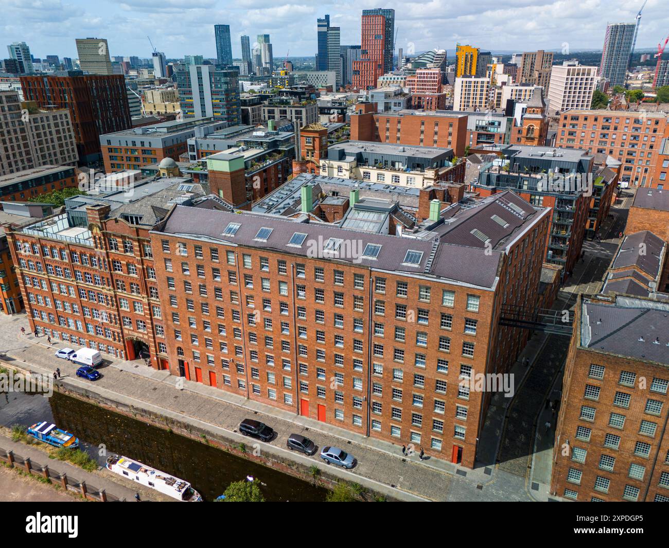 Red brick, old cotton mills buildings next to Rochdale canal in Ancoats ...
