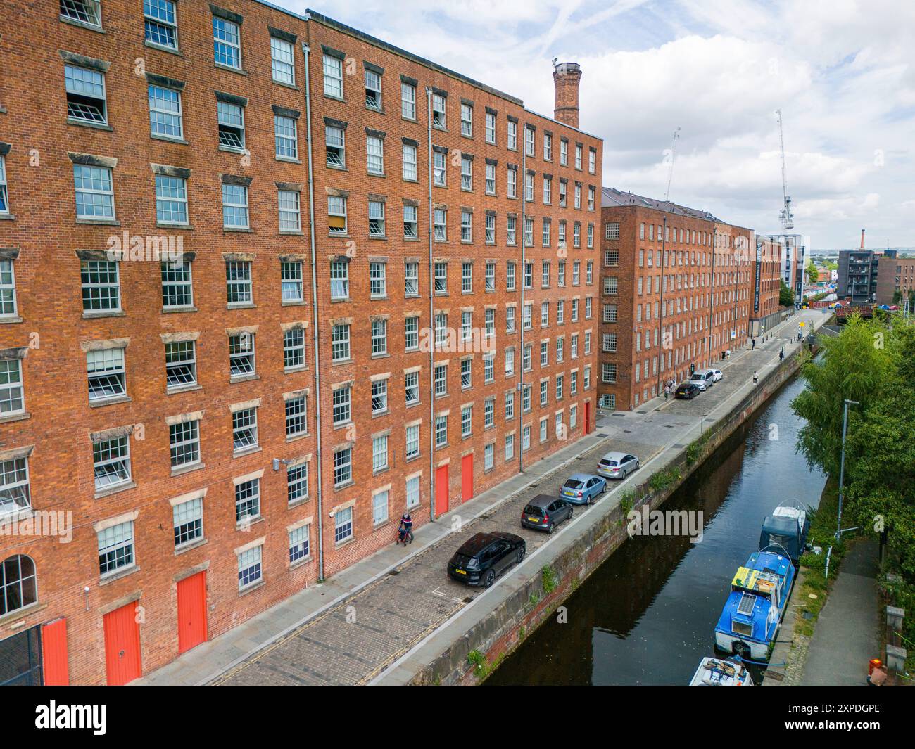 Red brick, old cotton mills buildings next to Rochdale canal in Ancoats ...