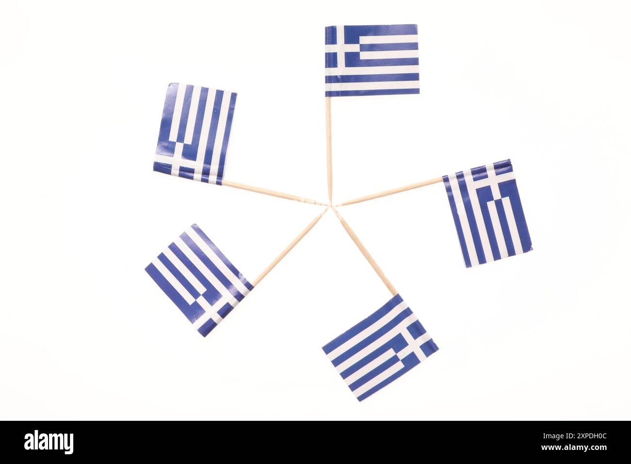 Small paper flags of Greece isolated on white Stock Photo - Alamy