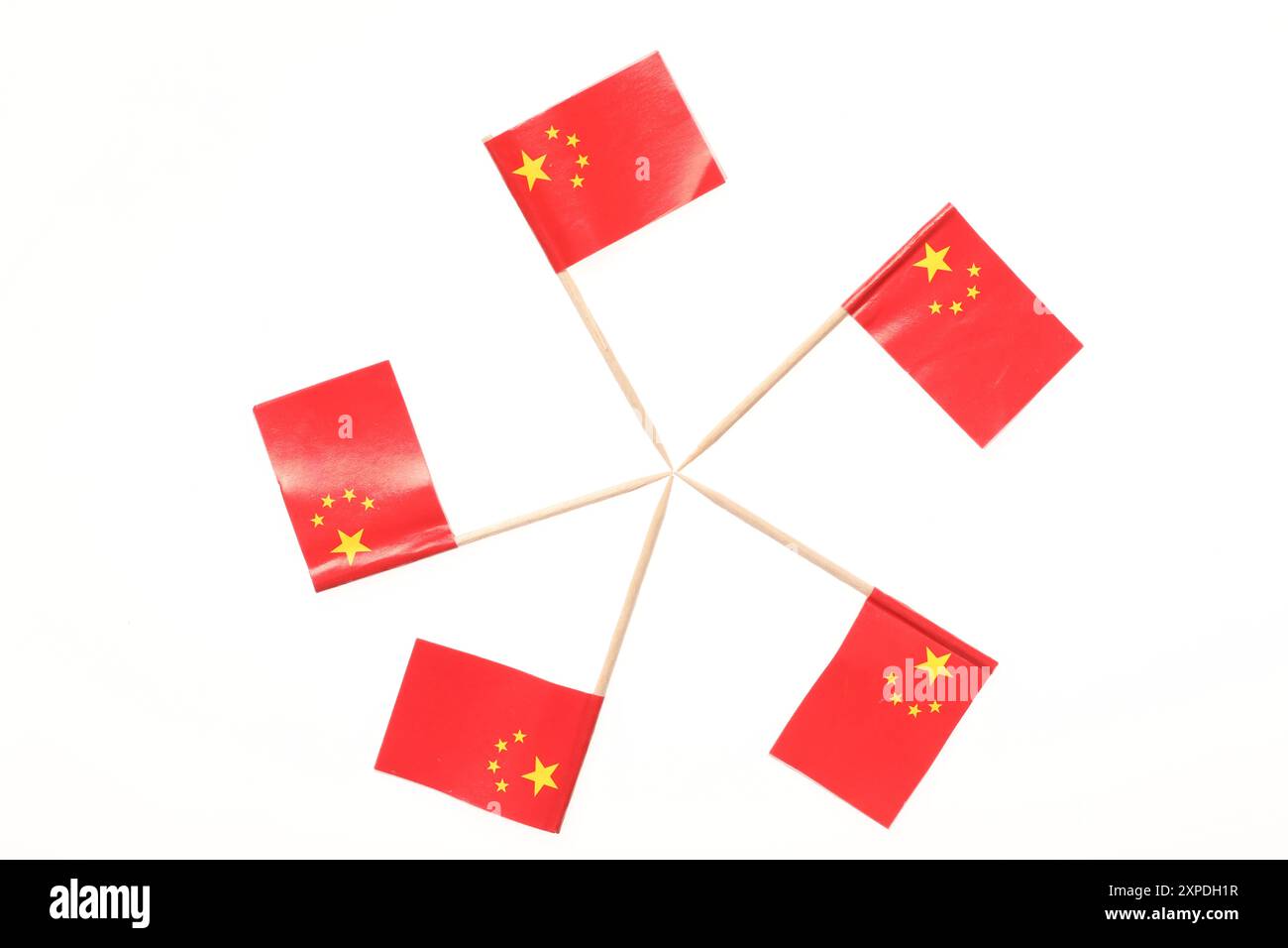Small paper flags of China isolated on white Stock Photo - Alamy