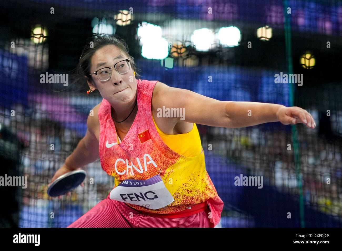 Feng Bin, of China, competes during the women's discus throw final at ...