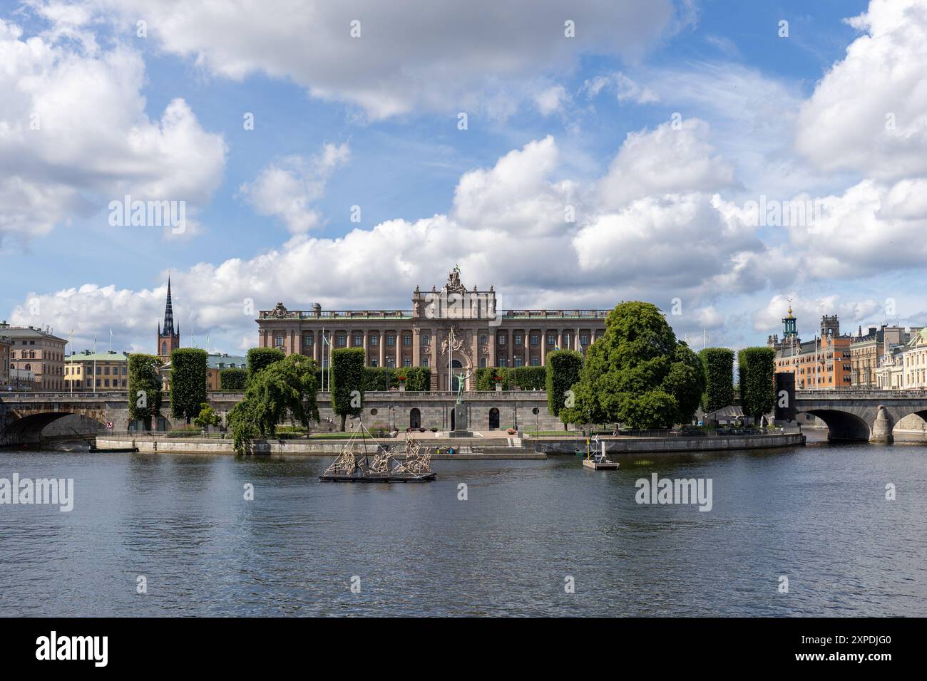 Stockholm, Sweden - July 16 2024: View of Swedish parliament building and surrounding water on ...