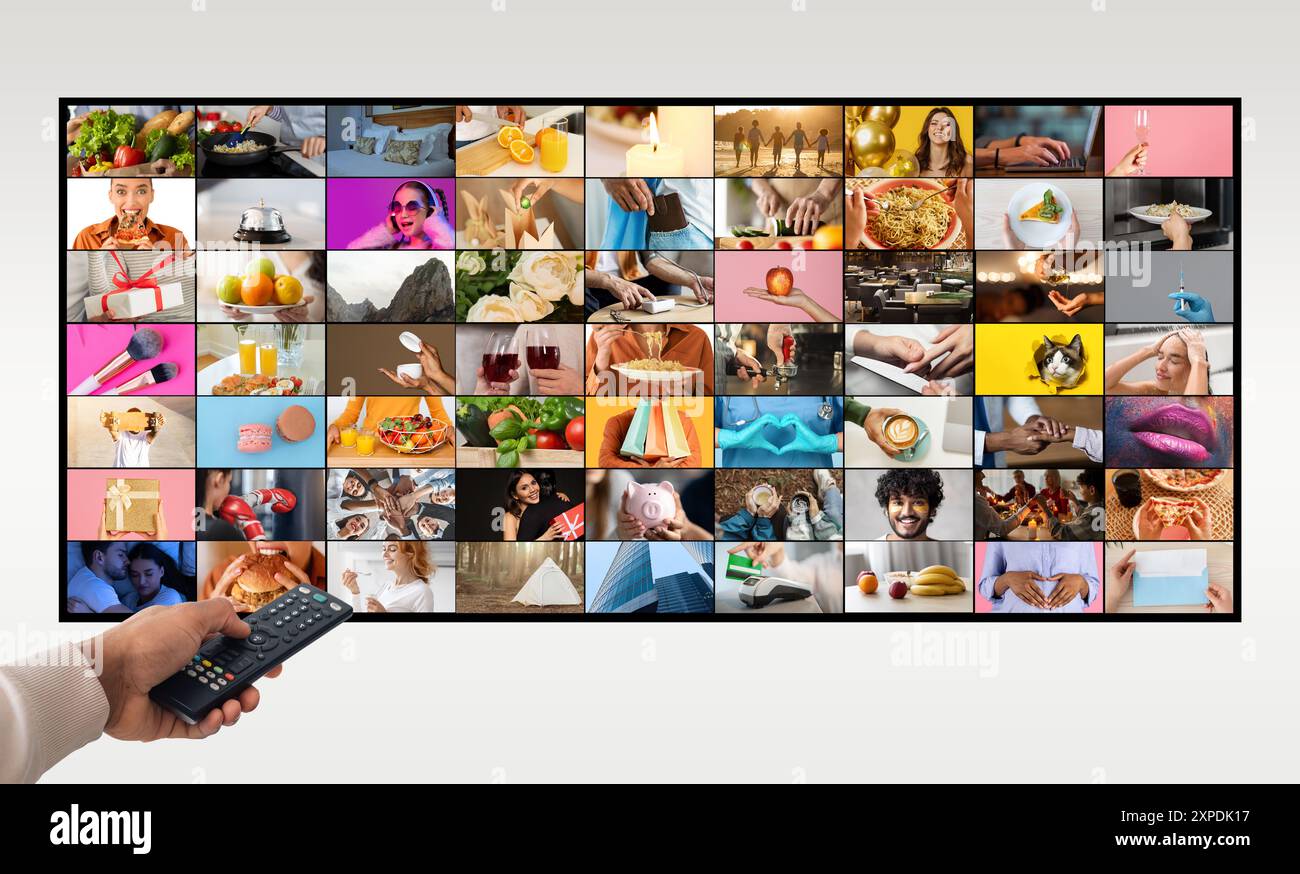 Hand Holding Remote Control In Front of Television Screen Stock Photo ...