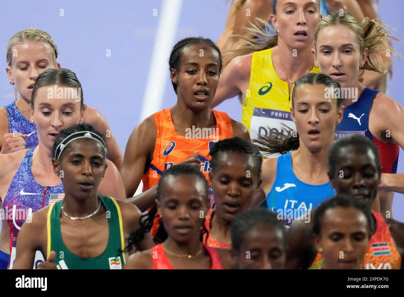 Sifan Hassan, of the Netherlands,, center, competes in the women's 5000 ...
