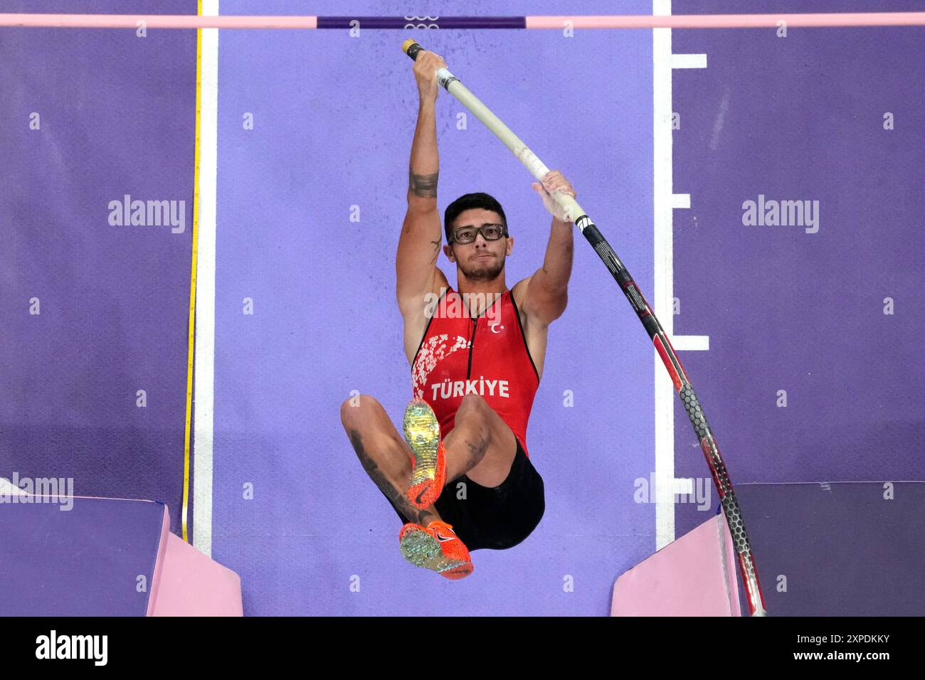 Ersu Sasma, of Turkey, competes in the men's pole vault final at the ...