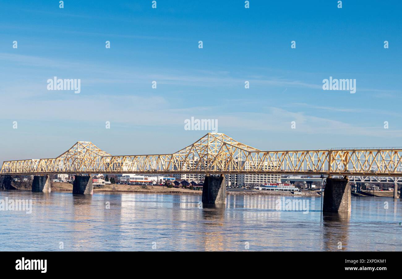 Steel cantilever truss bridge on stone pylons over wide river Stock ...