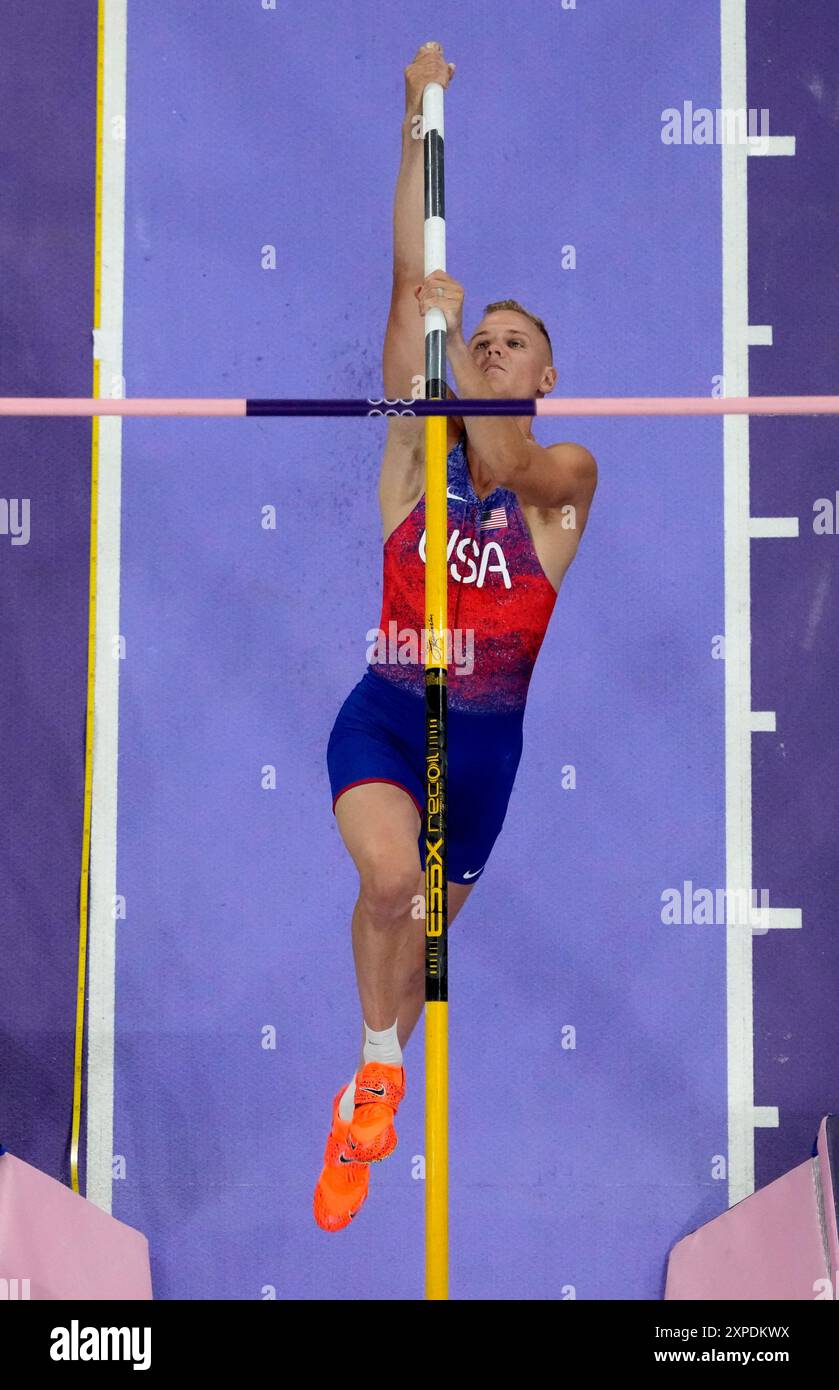 Sam Kendricks, of the United States, competes in the men's pole vault ...