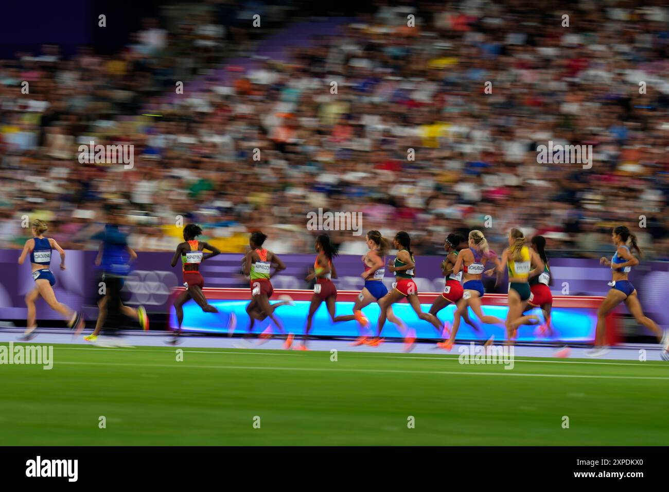 Competitors run in the women's 5000-meters final at the 2024 Summer ...
