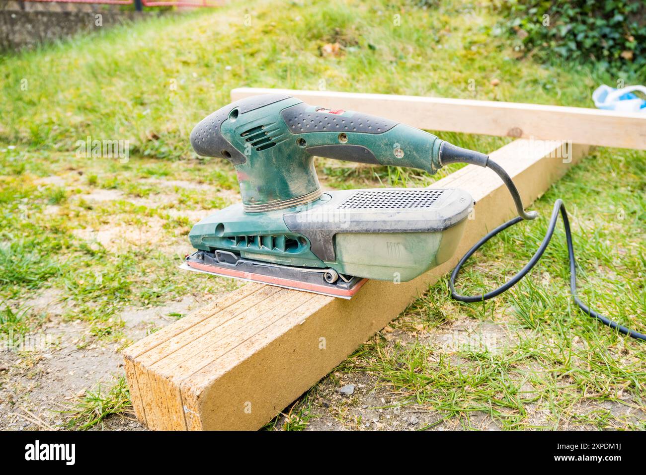 Electric Wood Planer hand held Green Machine. Planer close-up ...
