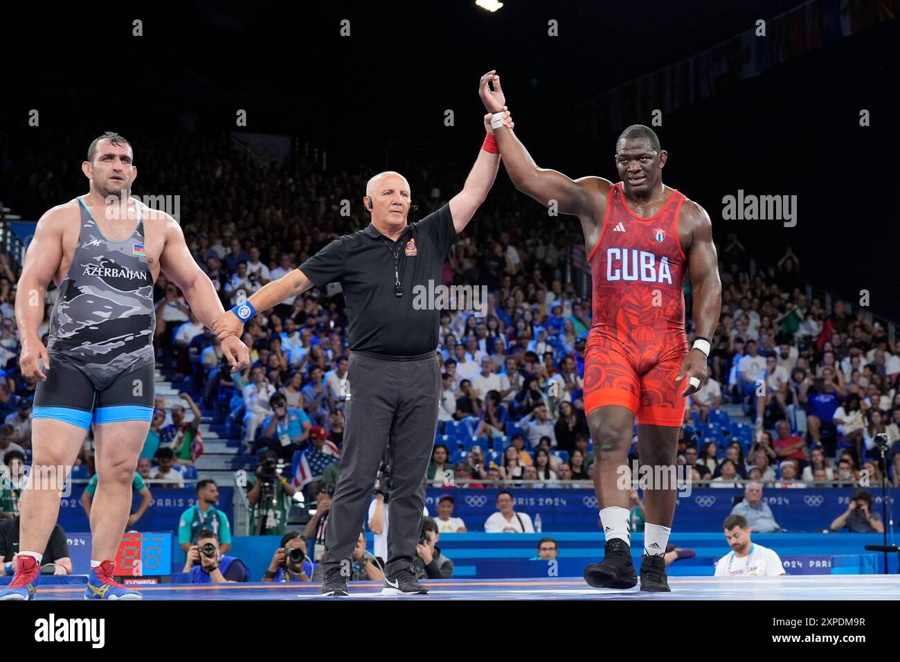 Cuba's Mijain Lopez celebrates after defeating Azerbaijan's Sabah ...