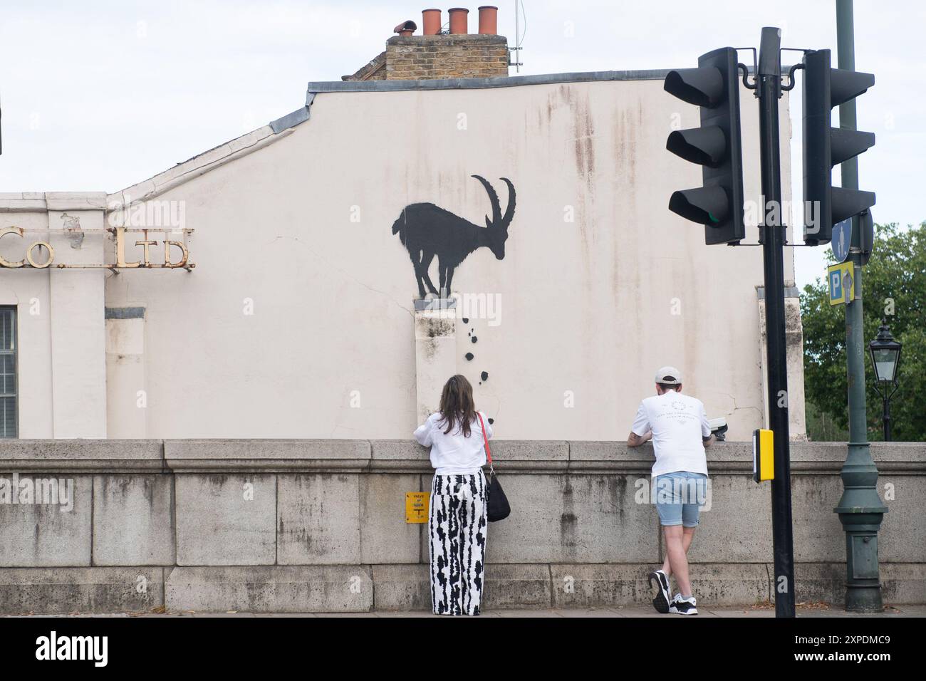 London, UK. 05 Aug 2024. People take photos of Street Artist Banksy's ...