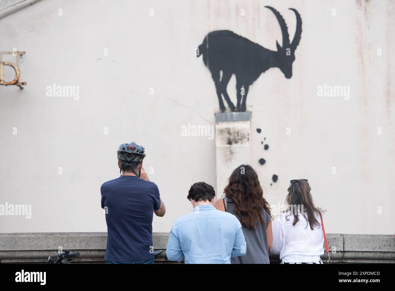 London, UK. 05 Aug 2024. People take photos of Street Artist Banksy's ...