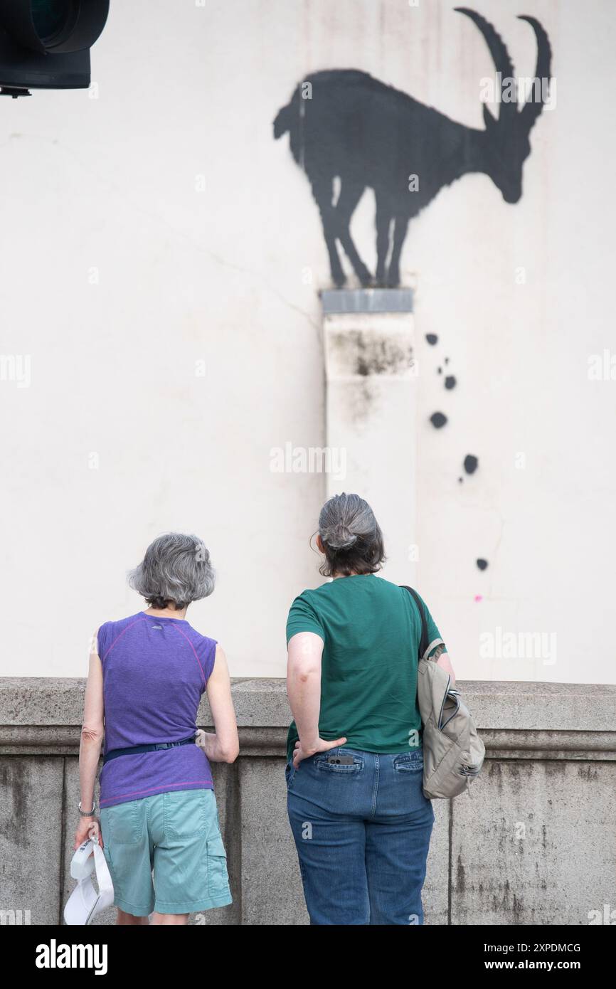London, UK. 05 Aug 2024. People take photos of Street Artist Banksy's ...