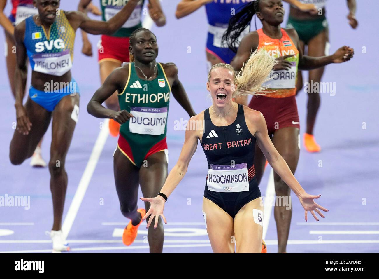 Keely Hodgkinson, of Britain, crosses the finish line to win the women ...