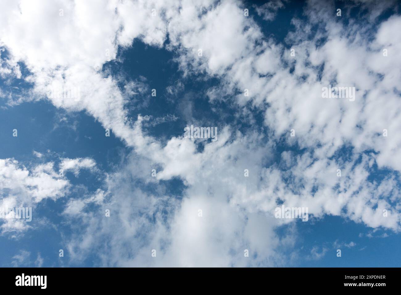 White clouds in blue sky Stock Photo - Alamy