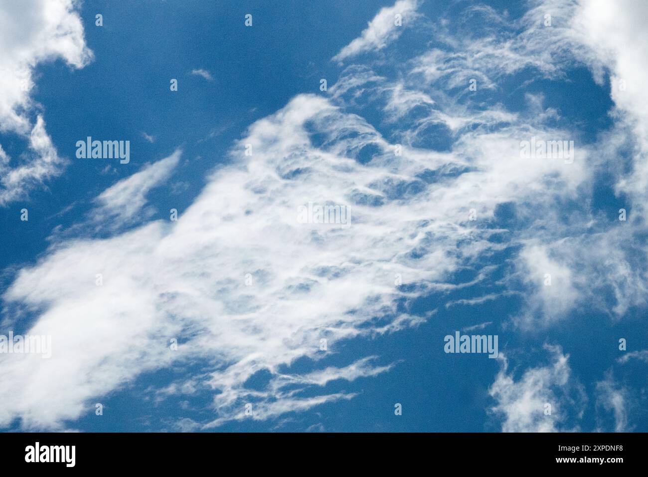 White clouds blue sky Summer Weather Stock Photo - Alamy