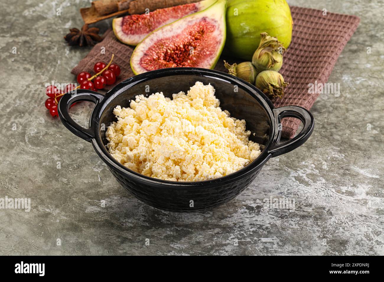 Delicous sheep cottage cheese curd served fig Stock Photo - Alamy