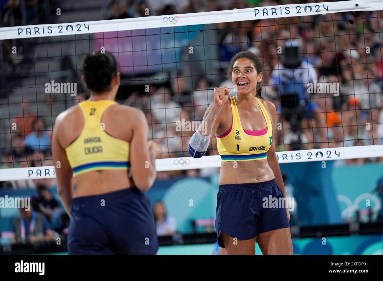 Brazil's Ana Patricia Silva Ramos, right, celebrates a point with ...